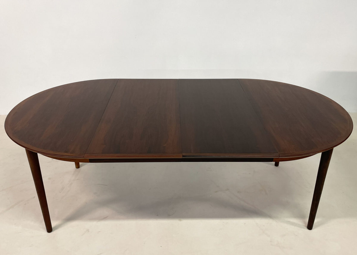Mid Century Modern Round Extendable Dining Table - Living in Style Gallery